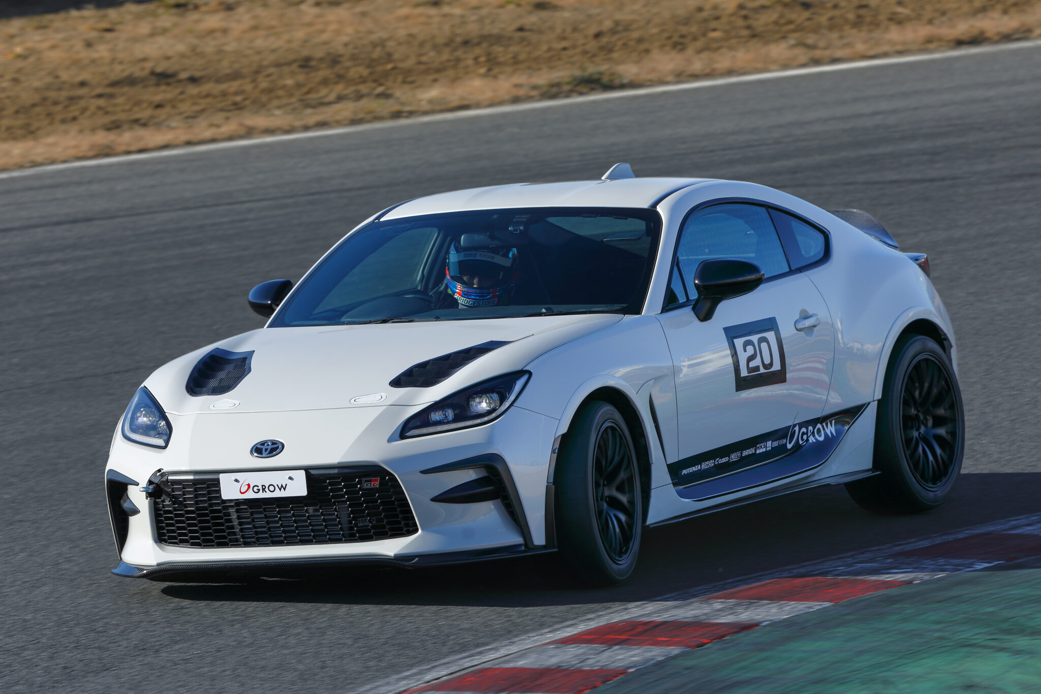 佐々木雅弘 GR86「オリジナルのダウンサス装着車両にターボを加えて狙う1分切り! 後日に59秒336をマーク!!」レーシングドライバーのマイカータイムアタック - REVSPEED