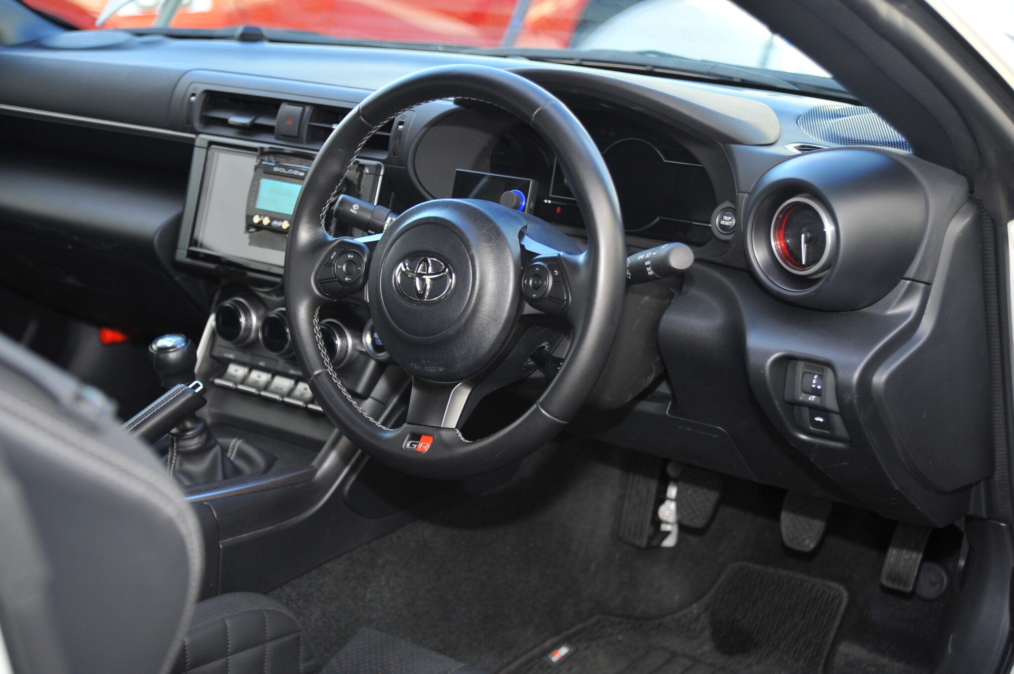 佐々木雅弘 GR86「オリジナルのダウンサス装着車両にターボを加えて狙う1分切り! 後日に59秒336をマーク!!」レーシングドライバーのマイカータイムアタック - REVSPEED