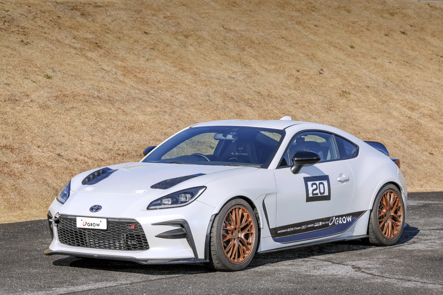 佐々木雅弘 GR86「オリジナルのダウンサス装着車両にターボを加えて狙う1分切り! 後日に59秒336をマーク!!」レーシングドライバーのマイカータイムアタック - REVSPEED